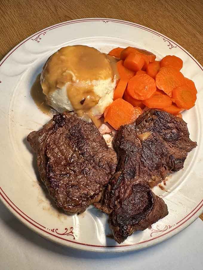 Ribeye so perfectly seared it makes you question every steak decision you've made before this moment.