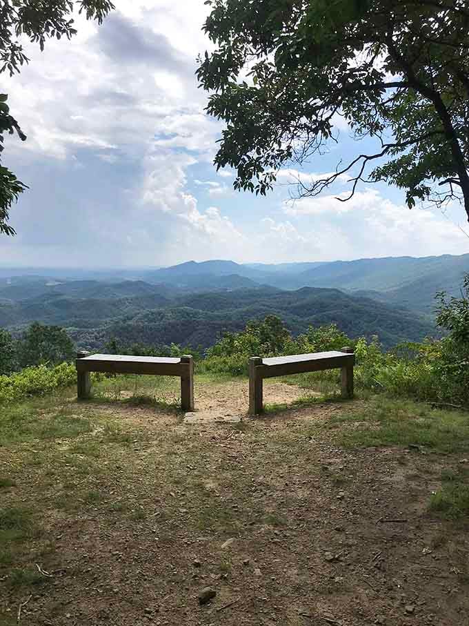 Two perfectly placed benches overlooking mountains that go on forever, the ultimate outdoor theater with the best show running.