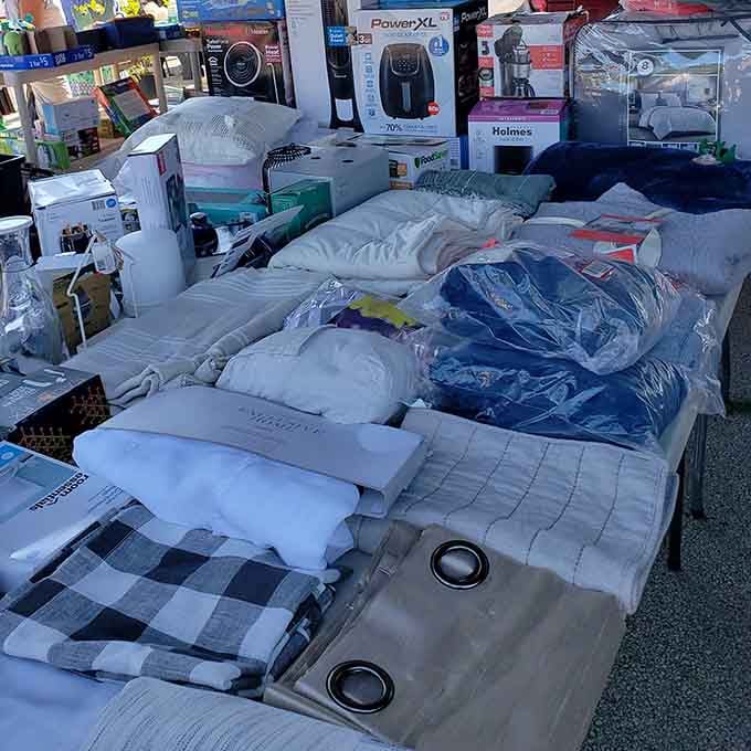 Linens and home goods stacked high, ready to transform your bedroom from college dorm chic to actual adult living space.