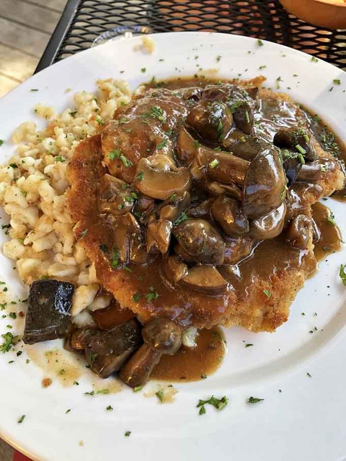 J&auml;ger Schnitzel drowns gloriously in mushroom sauce, proving that too much of a good thing is wonderful.