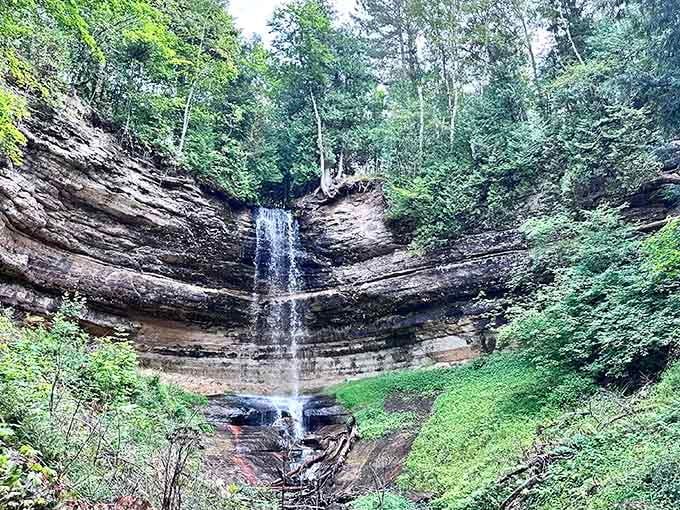 The amphitheater of stone cradles the waterfall in one of nature's most perfect designs.