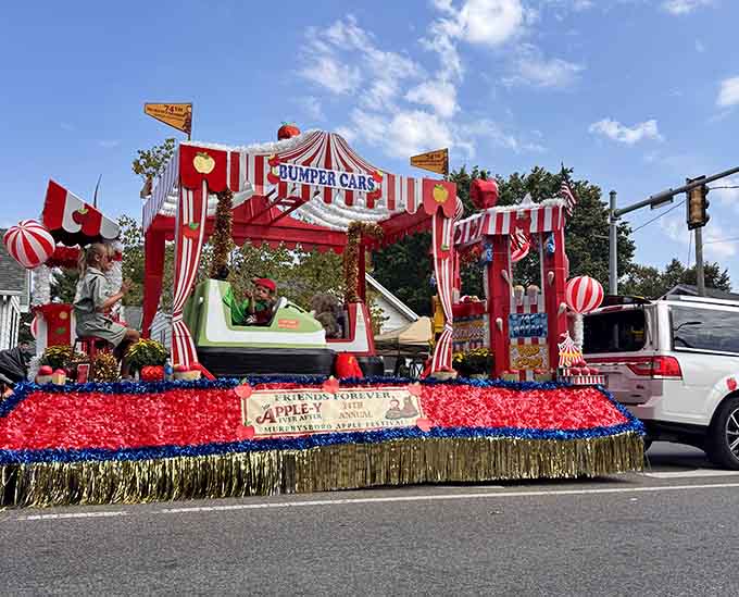 This bumper car float brings carnival whimsy to the streets, complete with enough red fringe to make Elvis jealous.