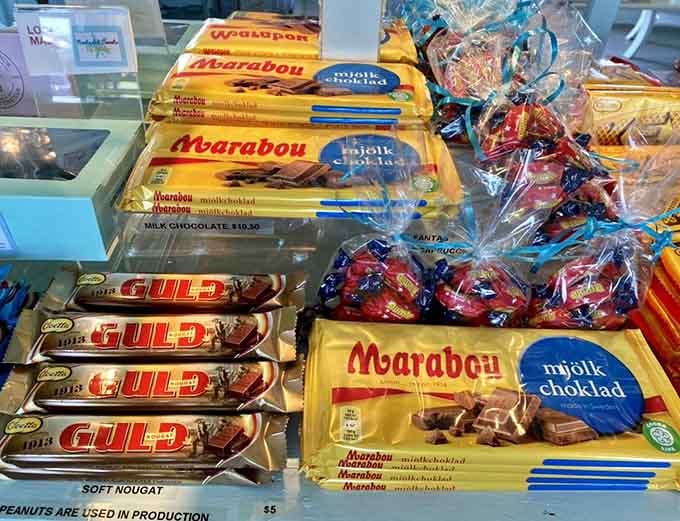 Marabou chocolate bars stacked like Swedish treasure, proving Scandinavia takes their cocoa as seriously as their design.
