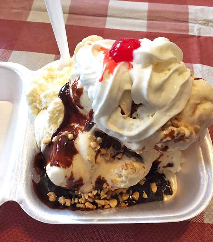 This hot fudge brownie sundae towers like a delicious monument to the concept that more is definitely more.