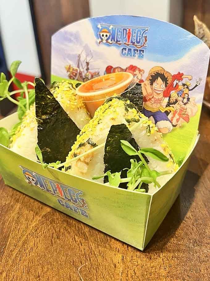Those triangular rice parcels wrapped in nori are the perfect tribute to one of anime's most touching moments.