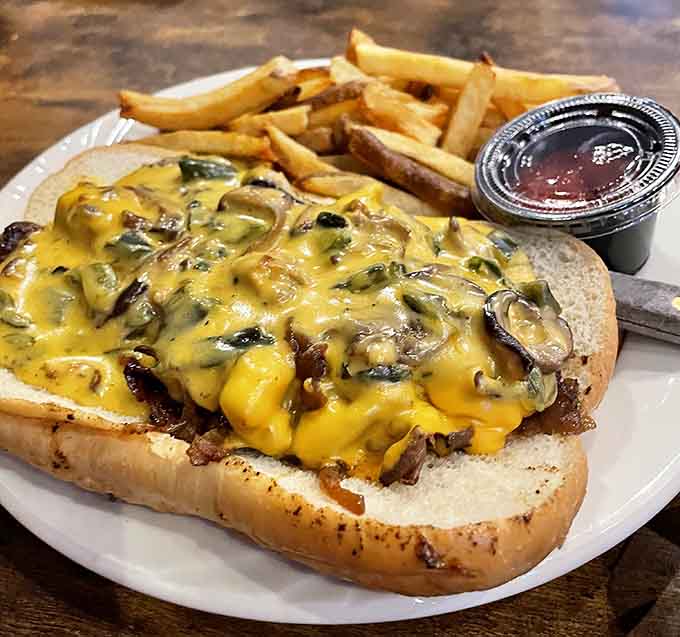 That cheese pull on a Philly cheesesteak is basically the Mona Lisa of sandwich photography, pure art.