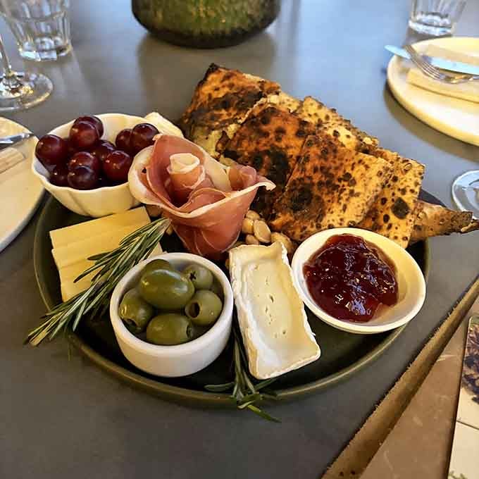 This charcuterie board has more personality than most people you'll meet at holiday parties this year.