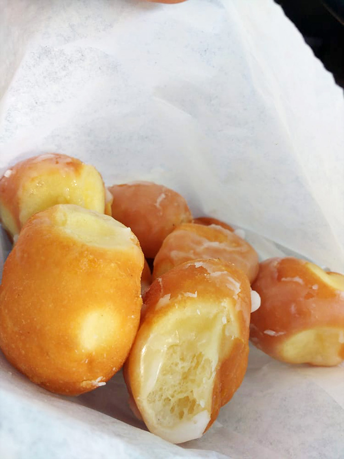 Golden donut holes proving that good things really do come in small, perfectly poppable packages.