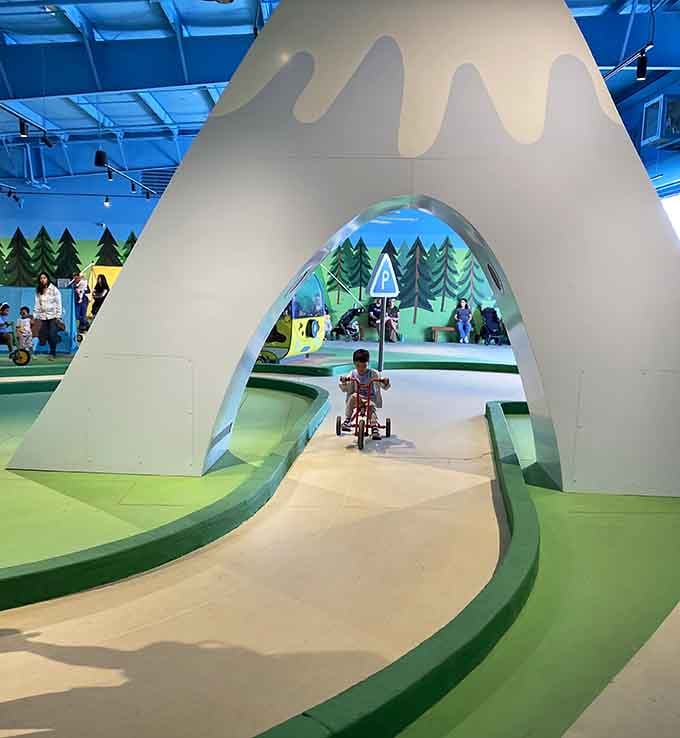 Indoor pedaling adventures where tiny cyclists navigate tracks like they're training for the Tour de Peppa.