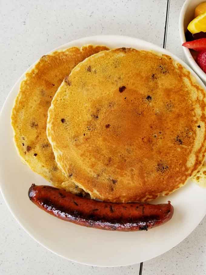 These golden pancakes with sausage links are the kind of simple perfection that never goes out of style.