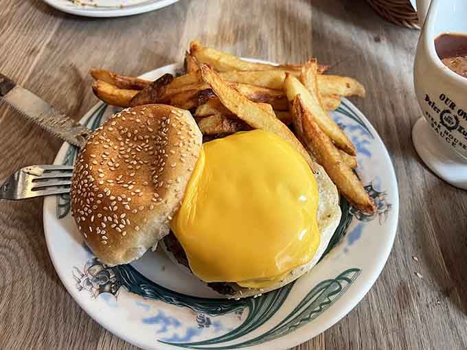 The lunch burger comes with golden fries, because even casual offerings get the royal treatment here.