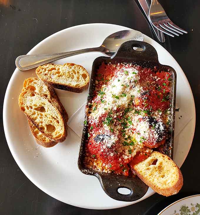 Meatballs in cast iron with crusty bread, because some traditions deserve respect and extra napkins.