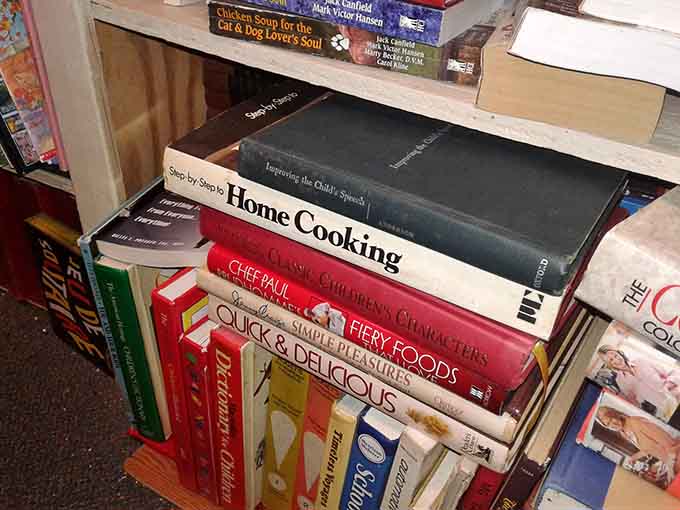 Cookbooks stacked high enough to turn anyone into the next Julia Child, or at least improve your meatloaf game.