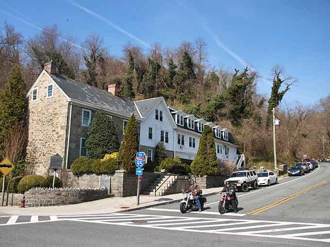 Stone houses cascade down to the water like they're racing to get the best river view first.