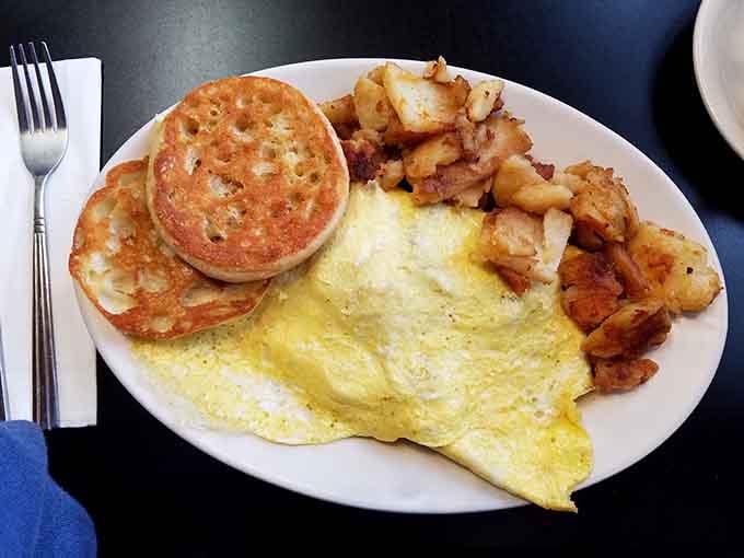 This omelette comes with enough protein to fuel a small construction crew or one very happy customer.