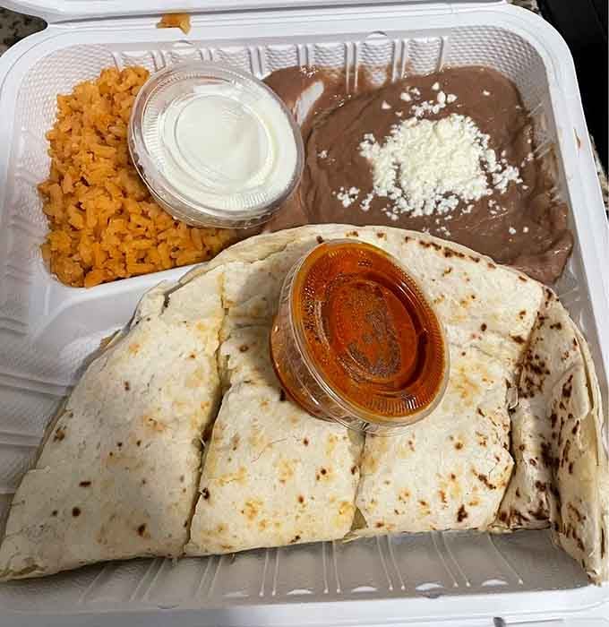 When the quesadilla arrives with rice, beans, and enough toppings to require architectural planning, you've struck gold.