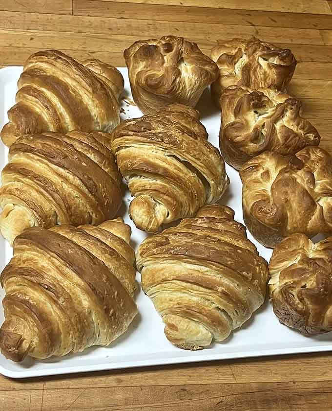 Golden croissants with those perfect flaky layers that make French pastry chefs nod approvingly from across the Atlantic Ocean.