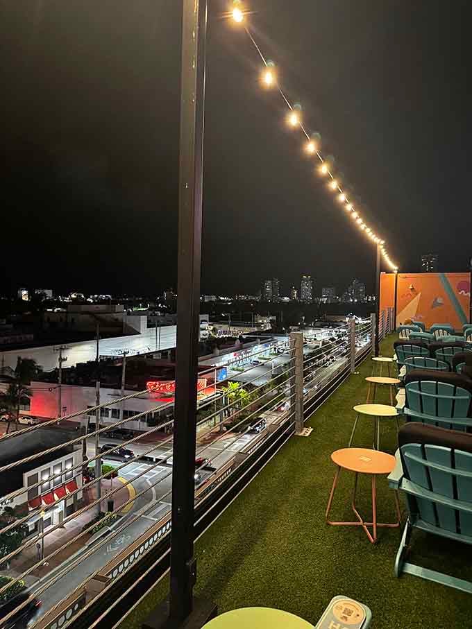 The city twinkles below while you're perched above it all, living your best rooftop movie fantasy life.