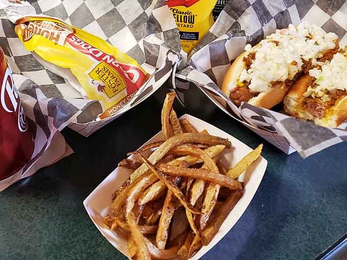 Fresh-cut fries and chili-topped dogs served on checkered paper: this is how lunch should always look.