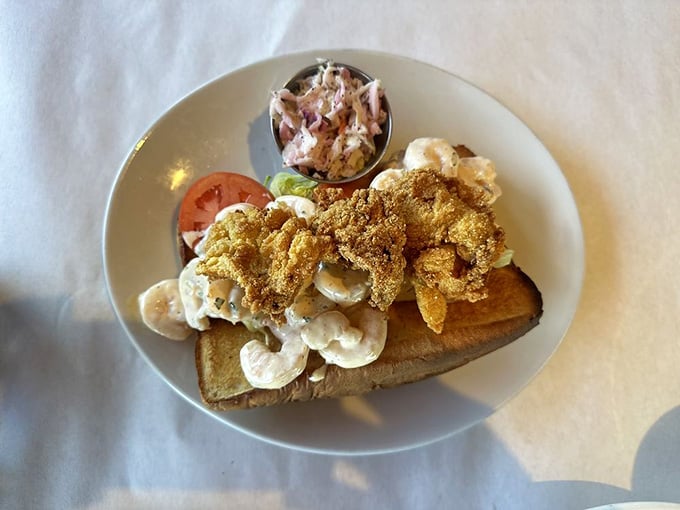 This po'boy stacked with fried seafood is what happens when Southern comfort meets Maryland waters perfectly.