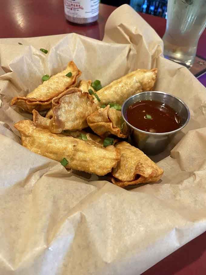 Golden dumplings arrive like little flavor bombs, ready to explode with savory goodness on your palate.