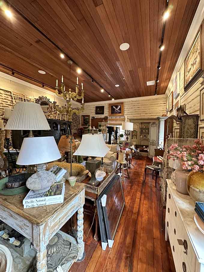 Vintage lamps and distressed furniture create an atmosphere that screams "sophisticated farmhouse chic" without trying too hard.