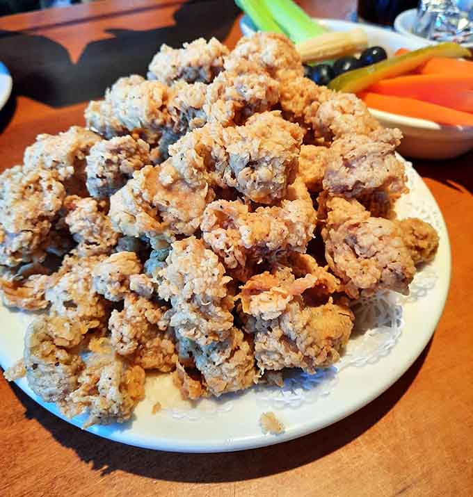 Golden fried gizzards piled high, because sometimes you need to embrace the delightfully unexpected appetizer.