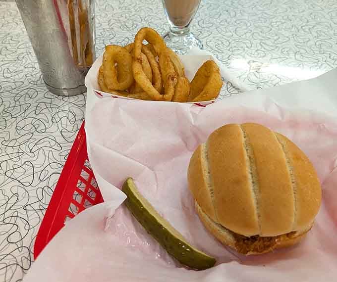 Golden onion rings and a sandwich combo that makes lunch feel like a special occasion worth celebrating.