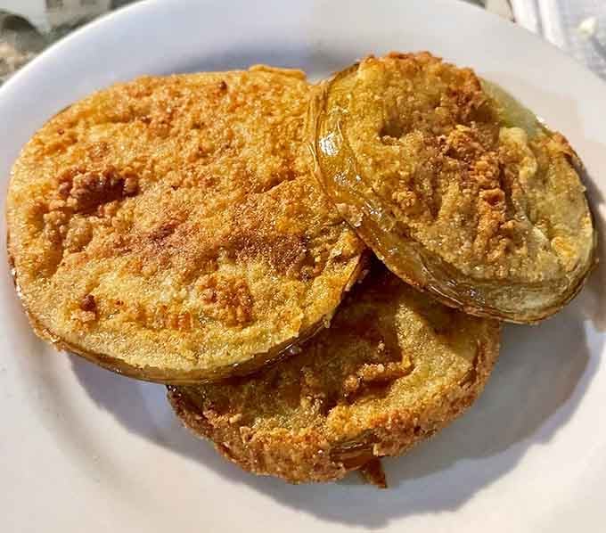 Fried green tomatoes arrive with that perfect crunch you've been dreaming about all week.