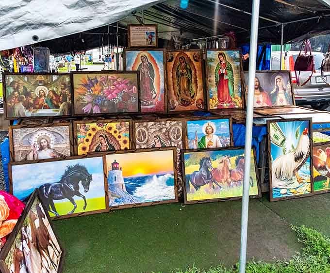 Religious art and wild horses share wall space in perfect flea market harmony, no judgment here.