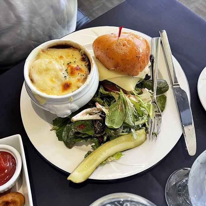 Even the burger gets the upscale treatment here, arriving with sides that mean serious business.