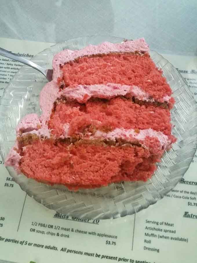 Pink raspberry cake that looks like it belongs at a fairy tale wedding but tastes even better than that.