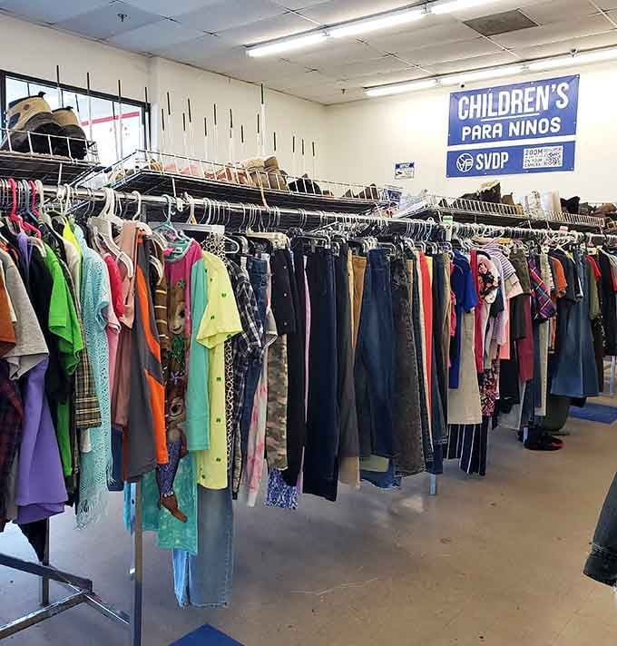 Racks of jeans and clothing organized by size, proving thrift stores don't have to be chaotic treasure hunts anymore.