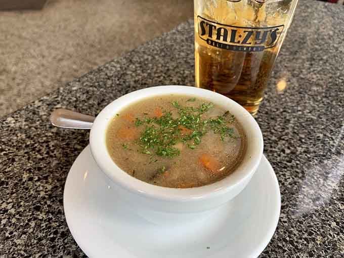 Homemade soup that warms you from the inside out, garnished with fresh herbs and served with genuine care.