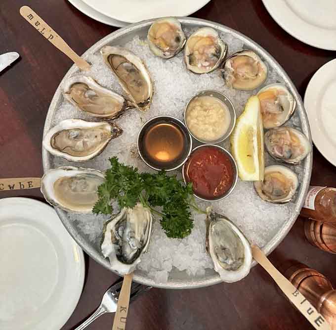 A proper oyster presentation on ice with mignonette and cocktail sauce is the mark of a restaurant that respects the bivalve.