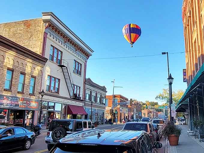 Hot air balloons drift over downtown because apparently Stillwater decided regular charm wasn't quite enough for one day.