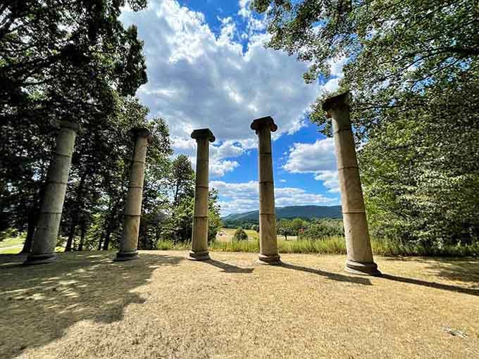 Classical columns framing mountain views, where ancient Rome meets the Hudson Valley in perfect harmony.