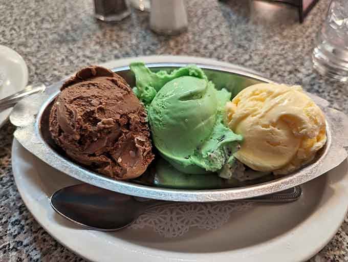 Three scoops of pure happiness on a plate, a chocolate-mint-vanilla trinity that would make any sundae jealous.