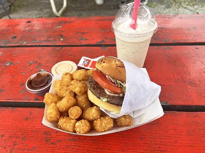 Golden tater tots, a loaded burger, and a creamy shake&mdash;the holy trinity of drive-in dining perfection.