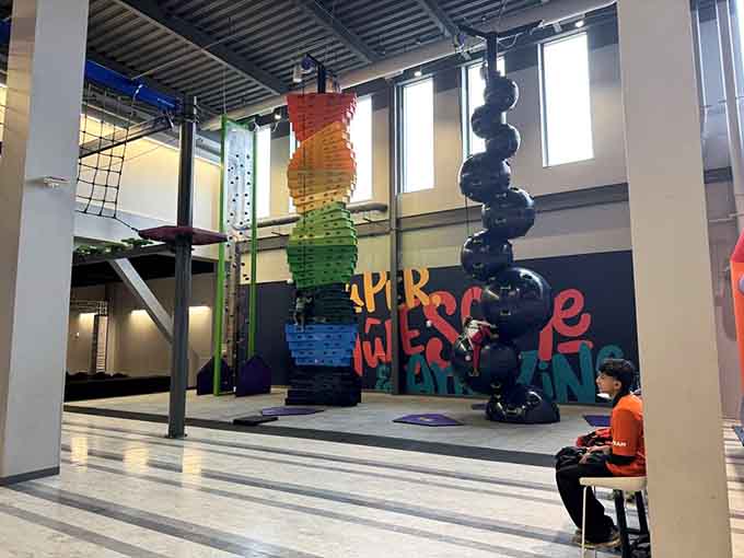 These colorful climbing blocks look deceptively simple until you're halfway up questioning your life choices completely.