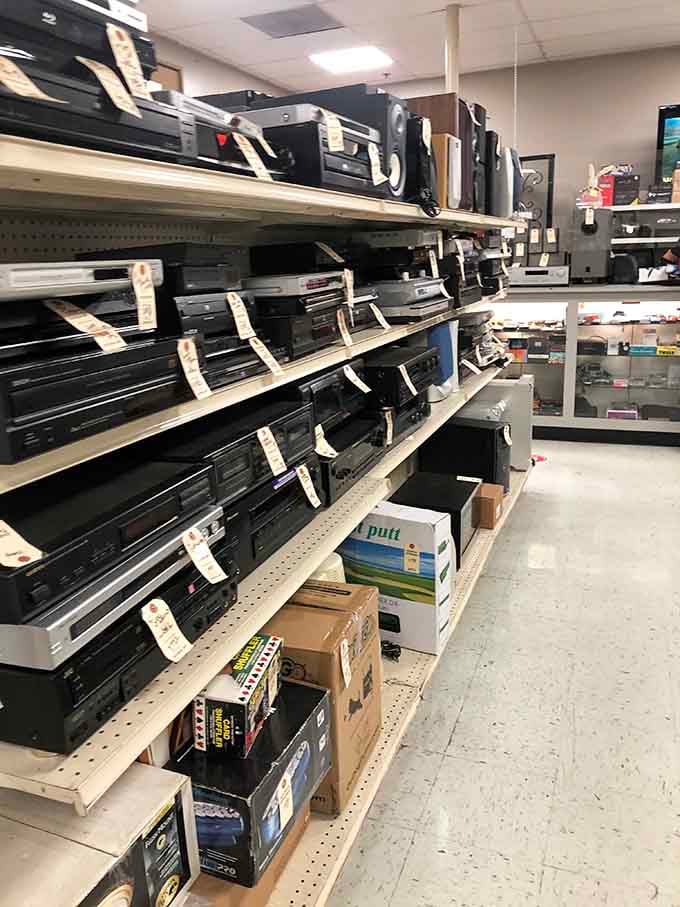 Electronics stacked like a time capsule of technology, from vintage to surprisingly current finds.