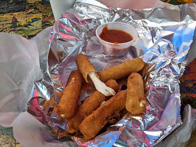 Golden mozzarella sticks with marinara sauce deliver exactly the kind of comfort your inner child craves today.