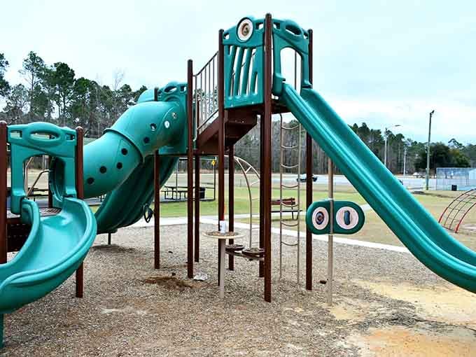 Bright playground equipment stands ready for kids who still know how to play without Wi-Fi.
