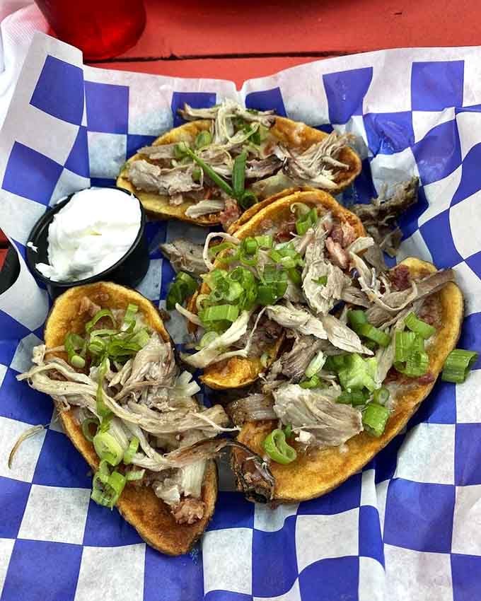 Potato skins loaded with pulled pork prove that fusion cuisine doesn't need to be fancy, just delicious.