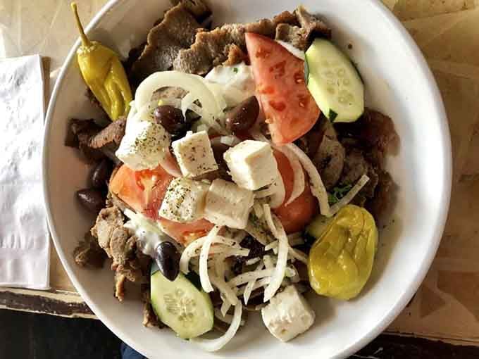 When your gyro comes loaded like this, you understand why some culinary marriages are meant to be.