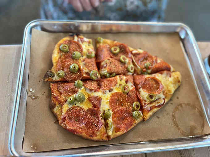 Flatbread that understands pepperoni and jalapeños were meant to be together, creating spicy, cheesy harmony on every slice.
