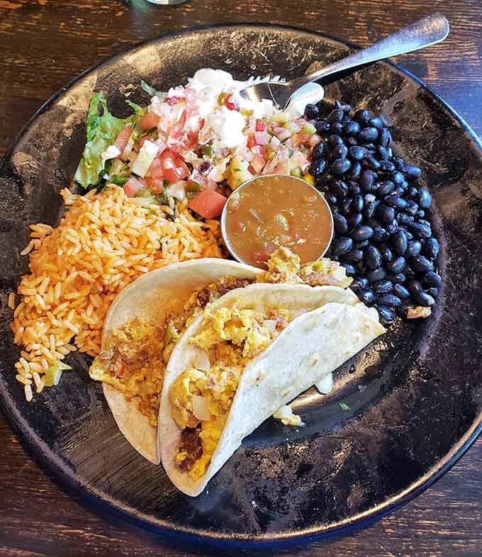 This Southwestern breakfast plate brings serious flavor firepower with eggs, beans, rice, and all the fixings you crave.