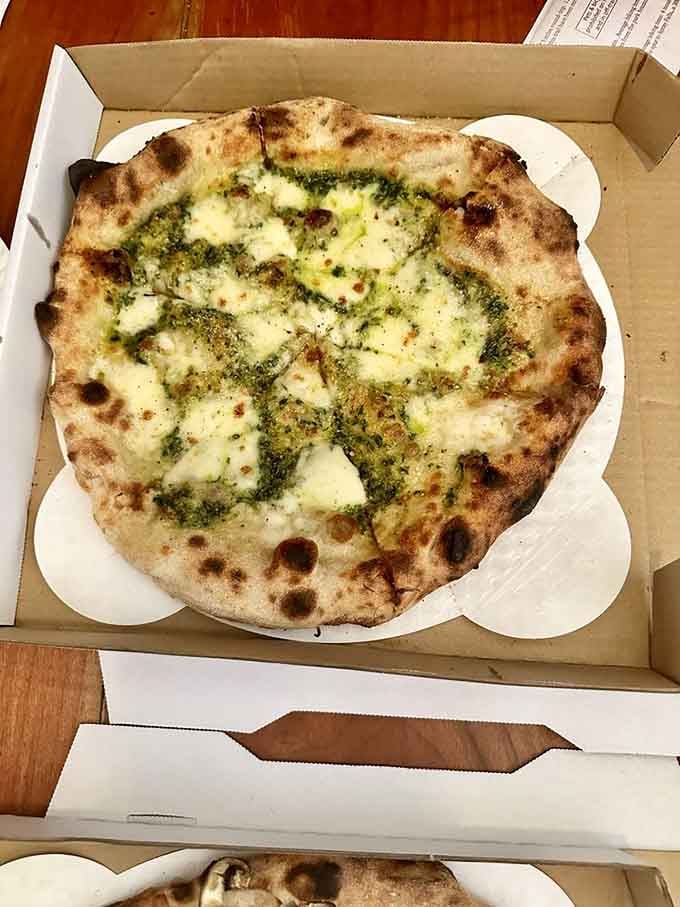 Roasted garlic pesto with cherry tomatoes delivers garden-fresh flavors that somehow taste even better than they look.