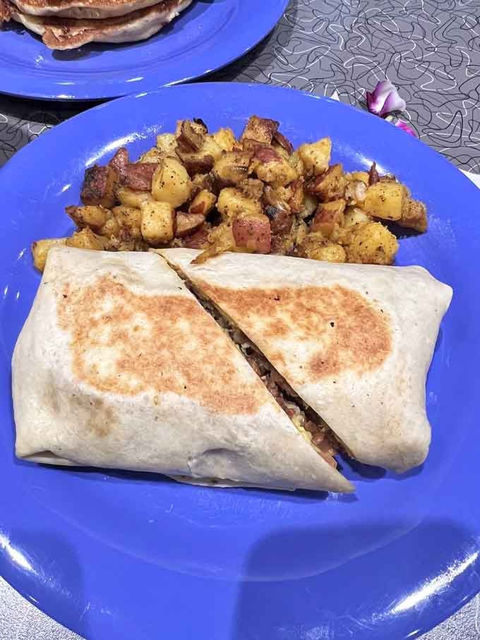 Meg's American delivers the classics without apology: eggs, bacon, pancakes, and those glorious seasoned home fries.