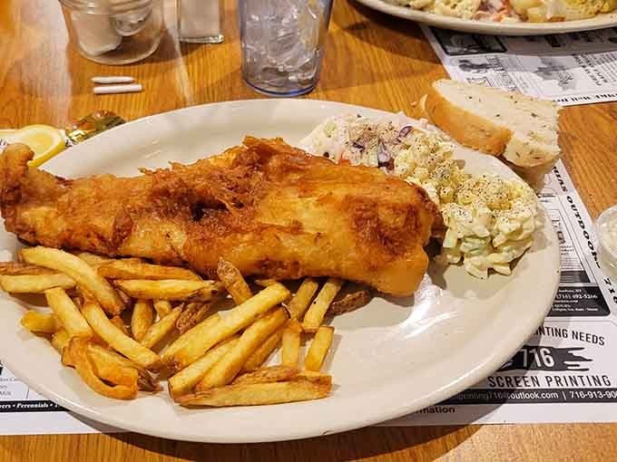 Golden fried fish with proper chips shows they take their classics seriously, coleslaw included for good measure.